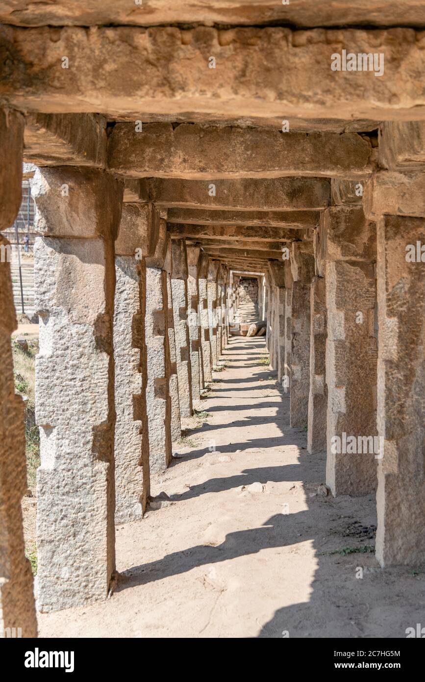 Arcade in Indian temple ruin Stock Photo - Alamy