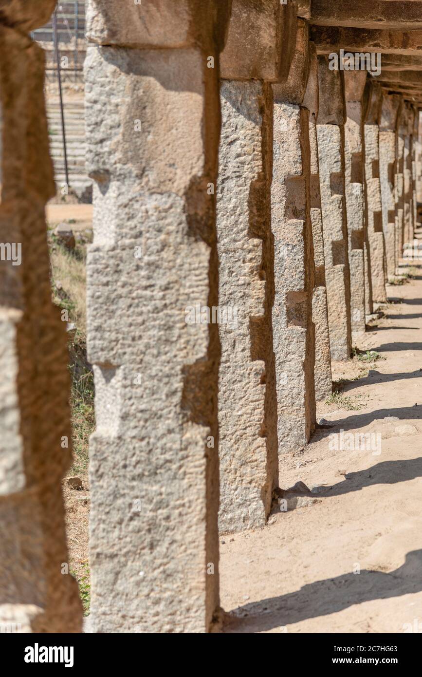 Arcade in Indian temple ruin Stock Photo - Alamy