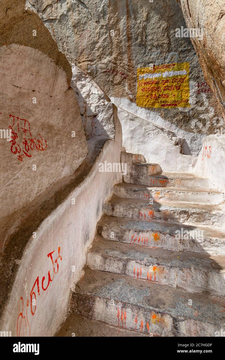 Painted stairs to the monkey temple with labeled rock wall Stock Photo ...