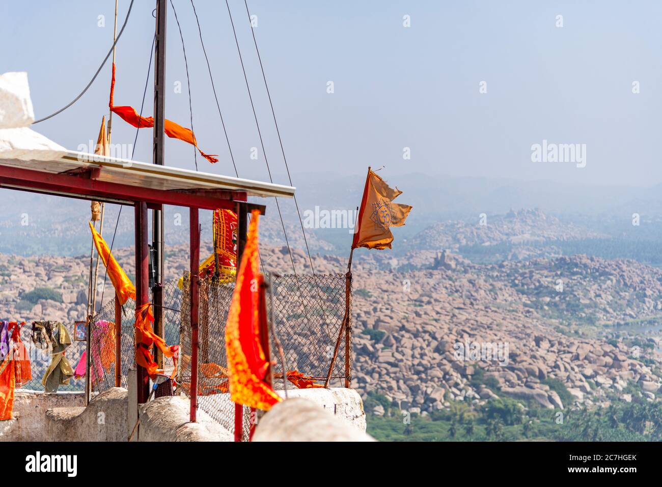 Parapet of the Monkey Temple with orange flags and rocks in the ...