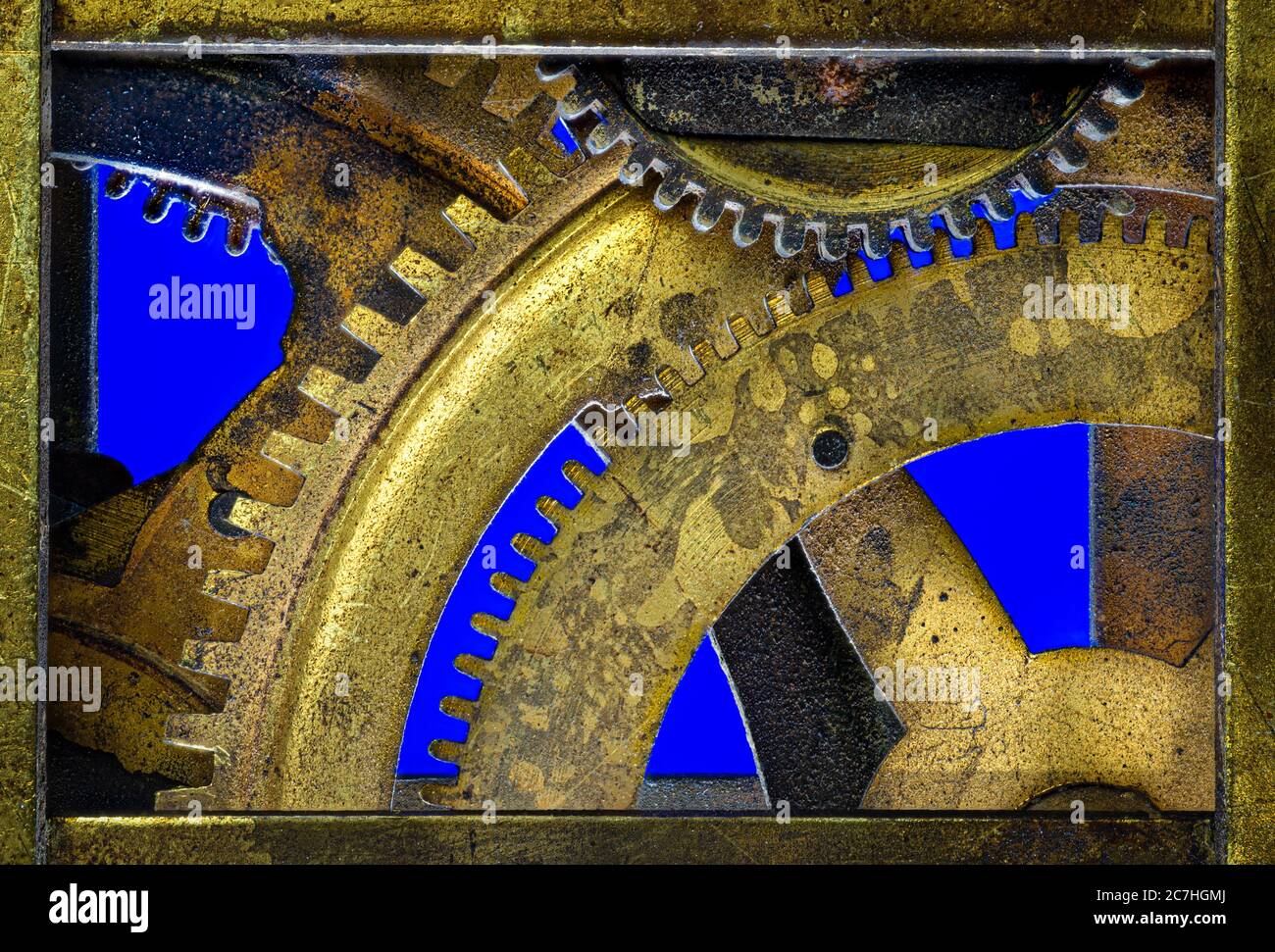 Macro view of old clockworks, showing brass wheels and gears Stock ...