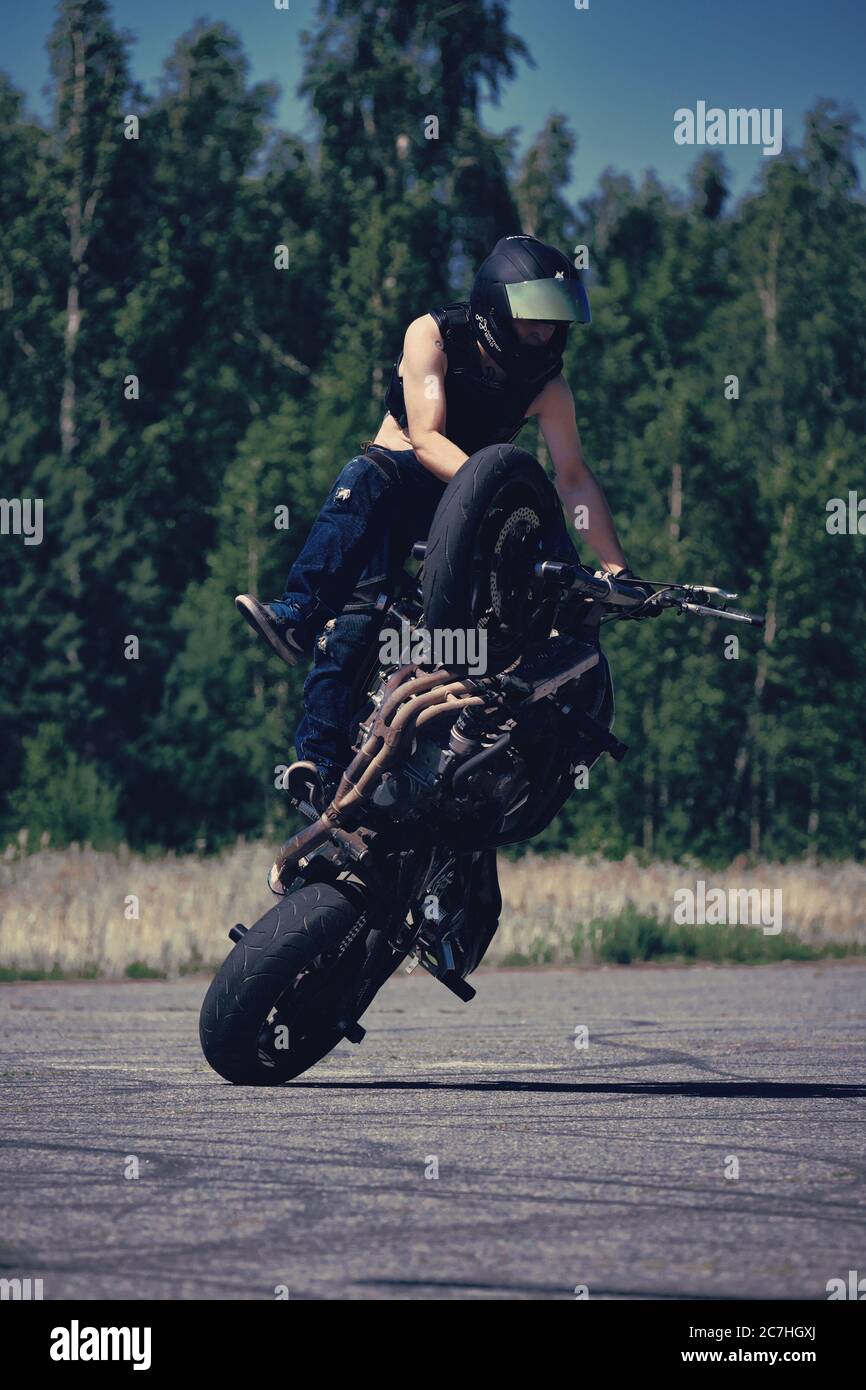 Motorcycle wheelie street hi-res stock photography and images - Alamy