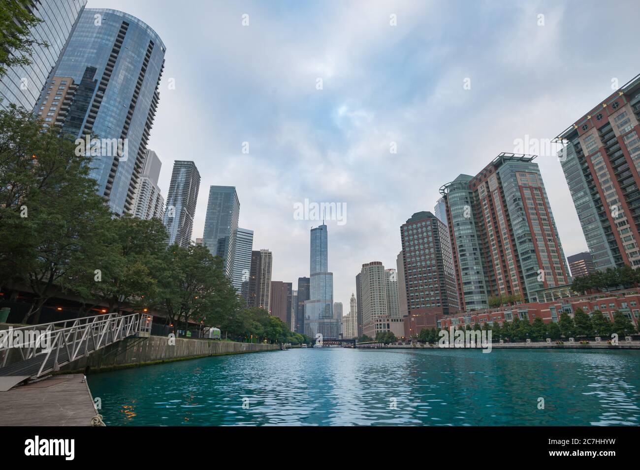 Tall Chicago buildings converge toward distant buildings along river ...