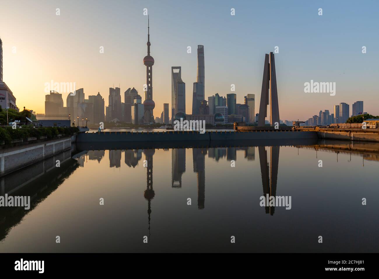 Shanghai Pudong Skyline at dusk - with water reflections of skyscrapers ...