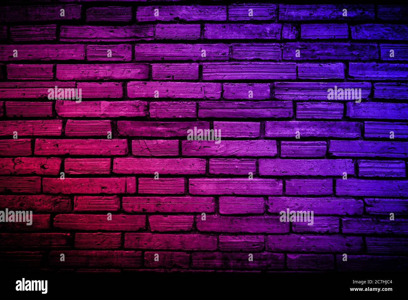 Neon light on brick walls that are not plastered background and texture ...