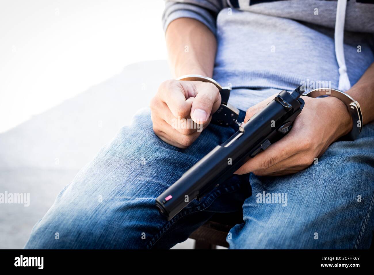 Handcuffed hands hi-res stock photography and images - Alamy