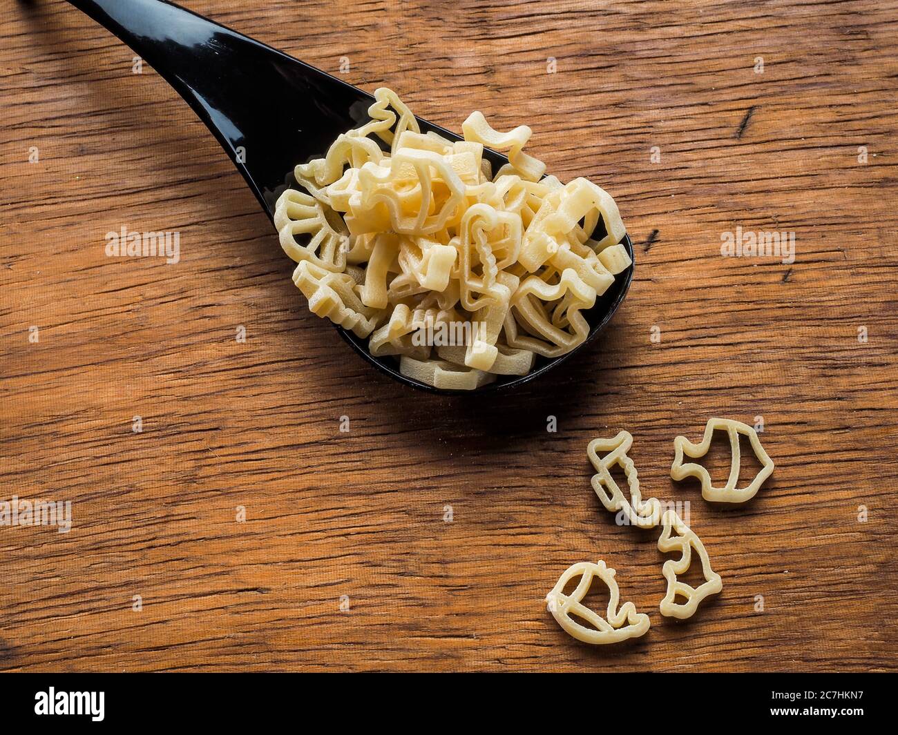 Durum wheat pasta with animal shapes for soup Stock Photo - Alamy