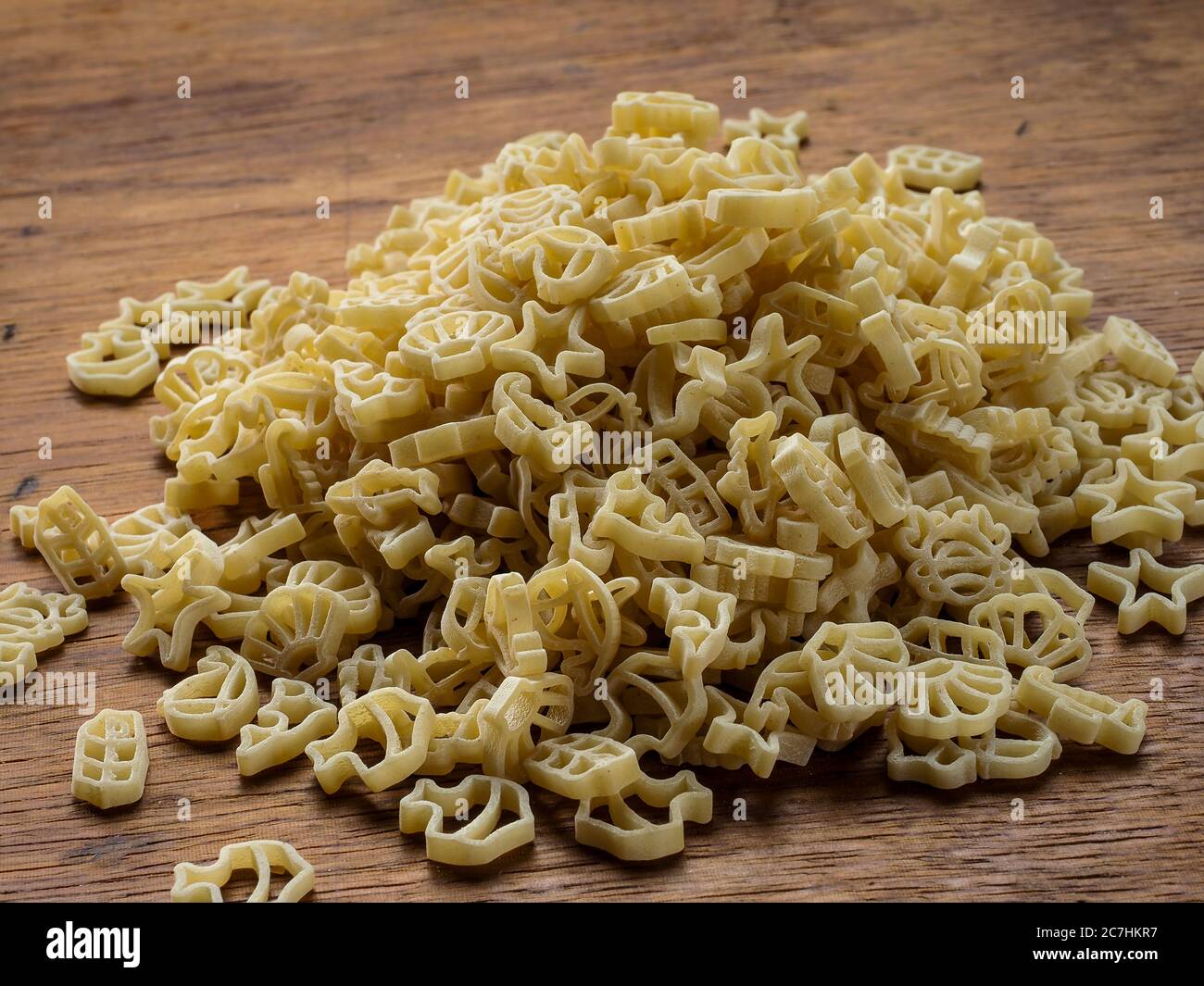Durum wheat pasta with animal shapes for soup Stock Photo - Alamy