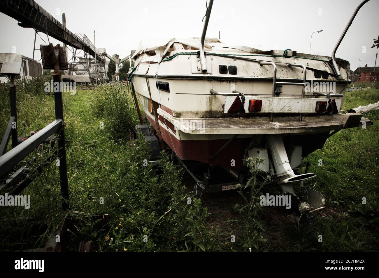 Old dirty disused boat in yard Stock Photo - Alamy
