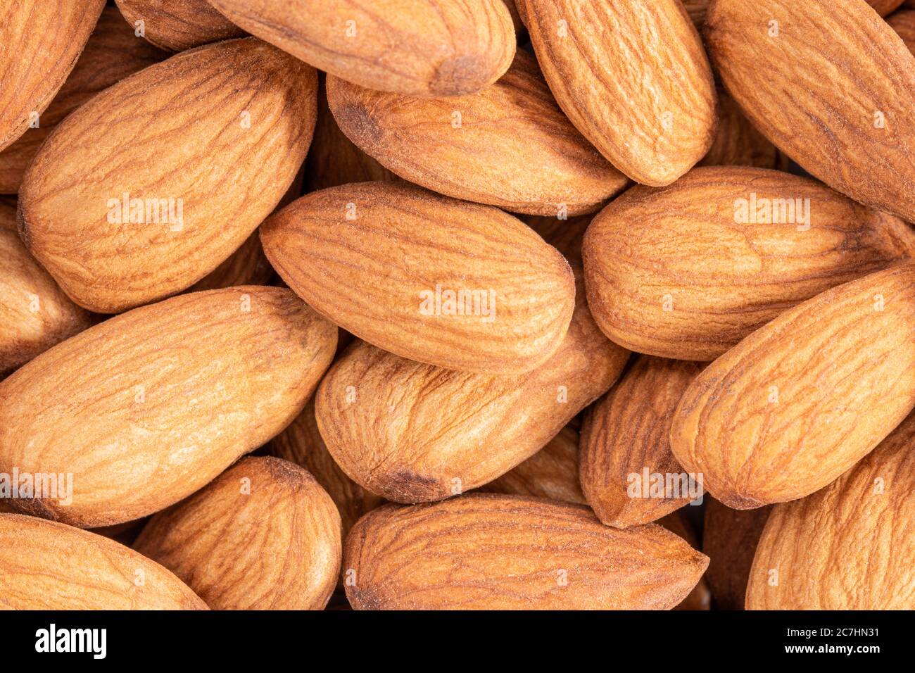 Almond background texture. Background of raw almond nut located ...
