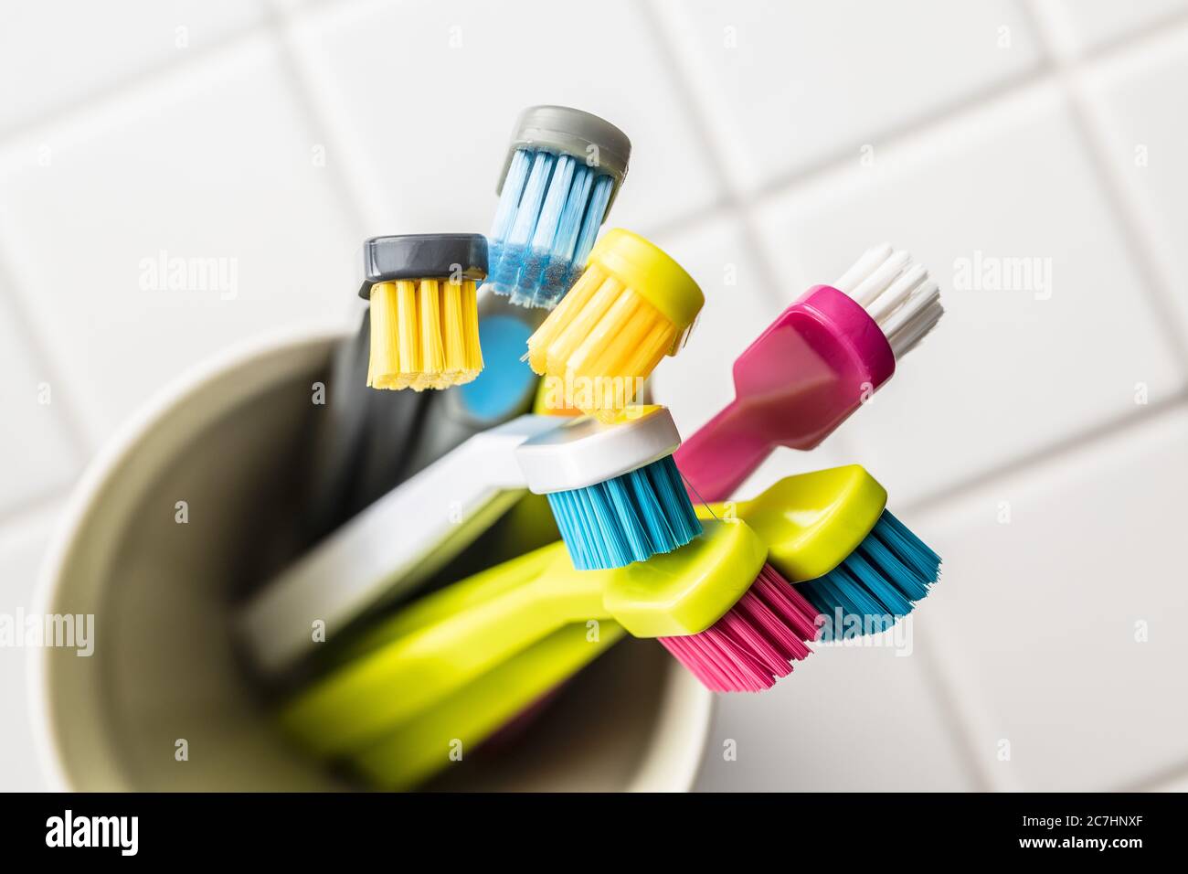 Toothbrush and toothpaste in cup hi-res stock photography and images ...