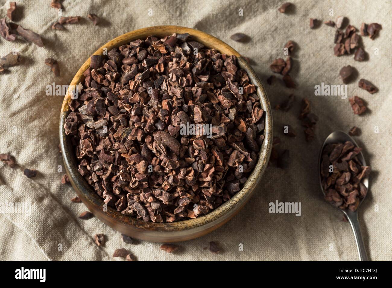 Raw Brown Organic Chocolate Cocao Nibs in a Bowl Stock Photo - Alamy