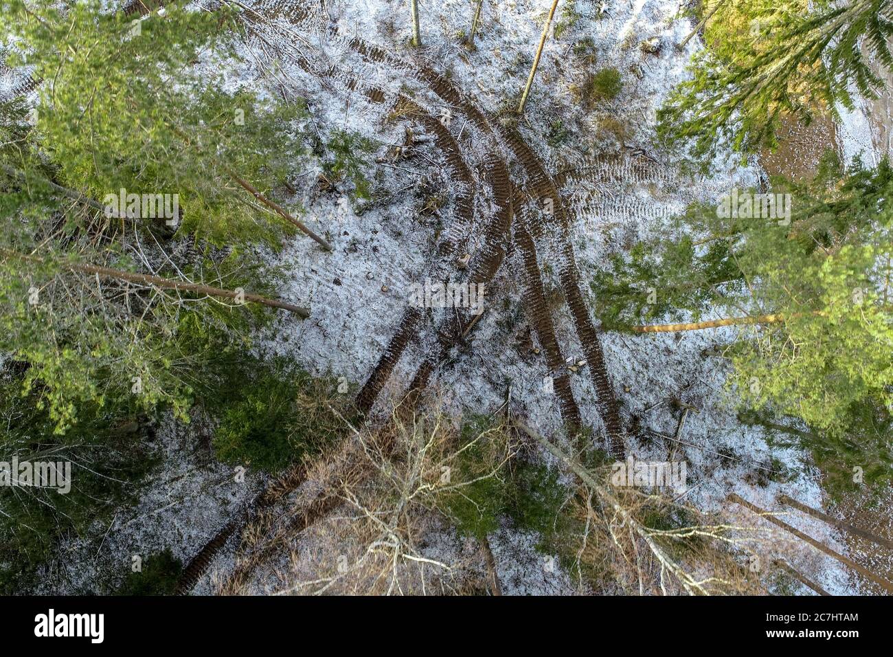 Overhead shot of an agricultural field with drops of snow in the ...