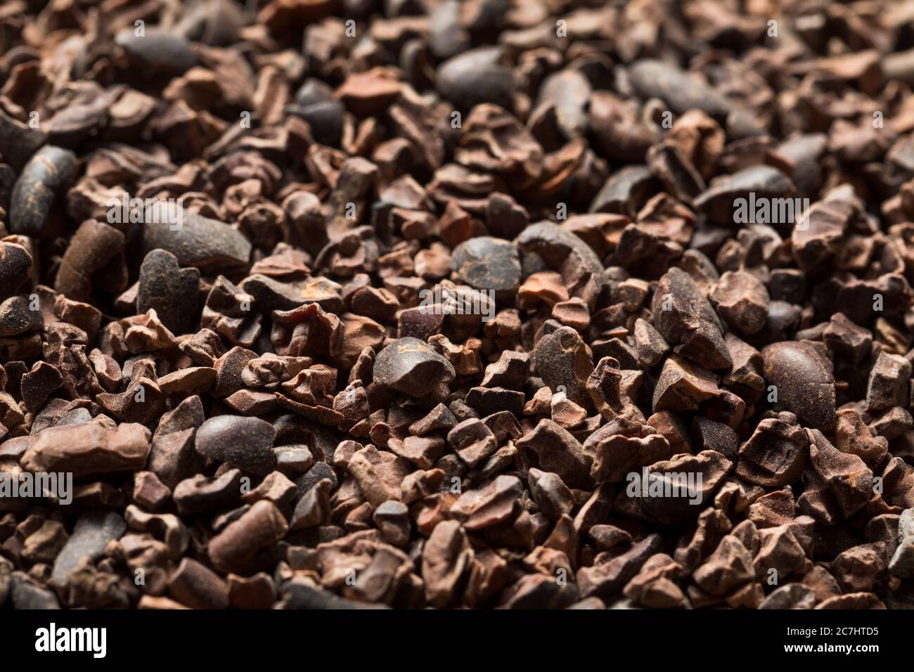 Raw Brown Organic Chocolate Cocao Nibs in a Bowl Stock Photo - Alamy