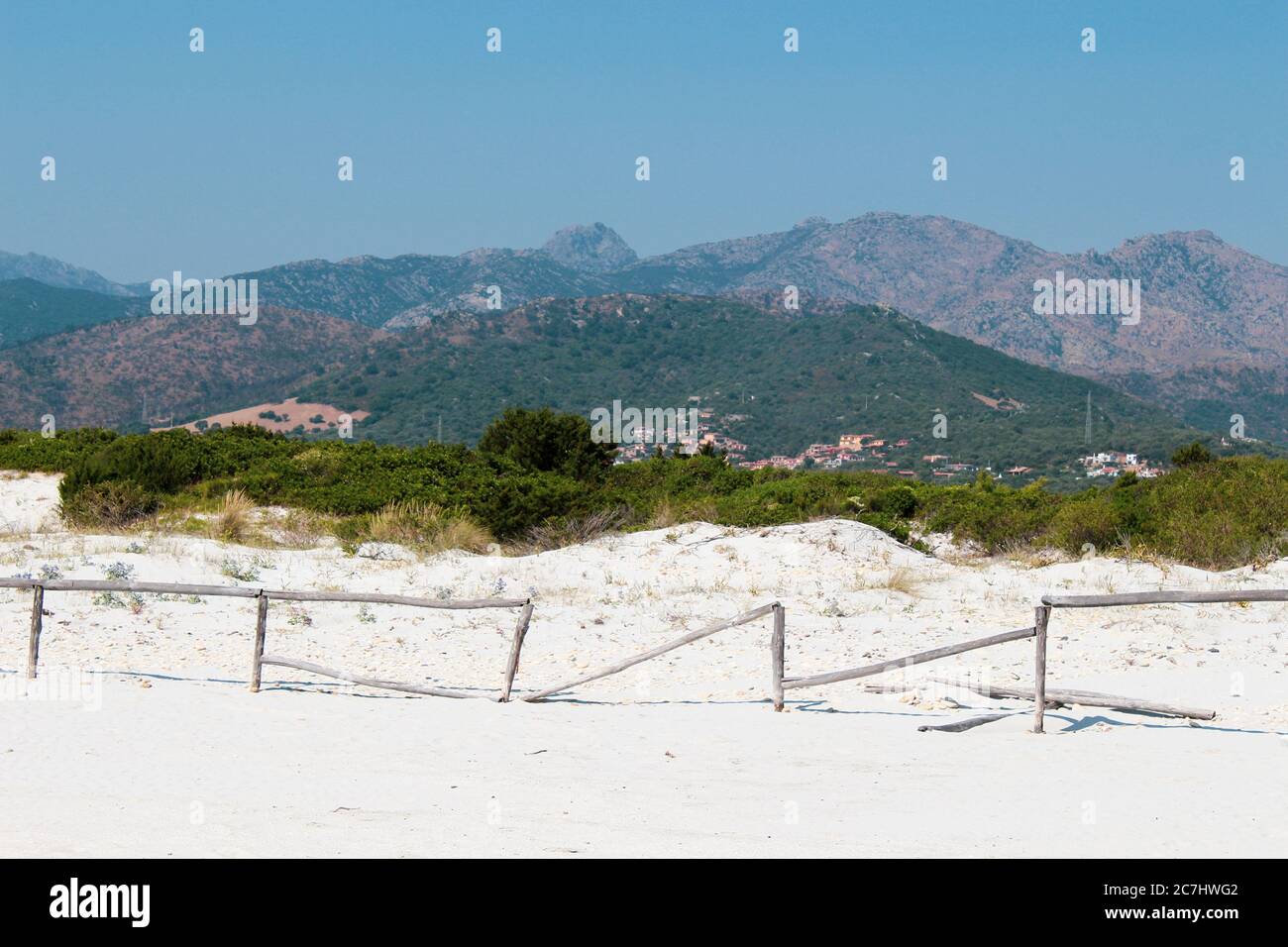 Wild sandy beach in San Teodoro, Sardinia and the mountains in the ...