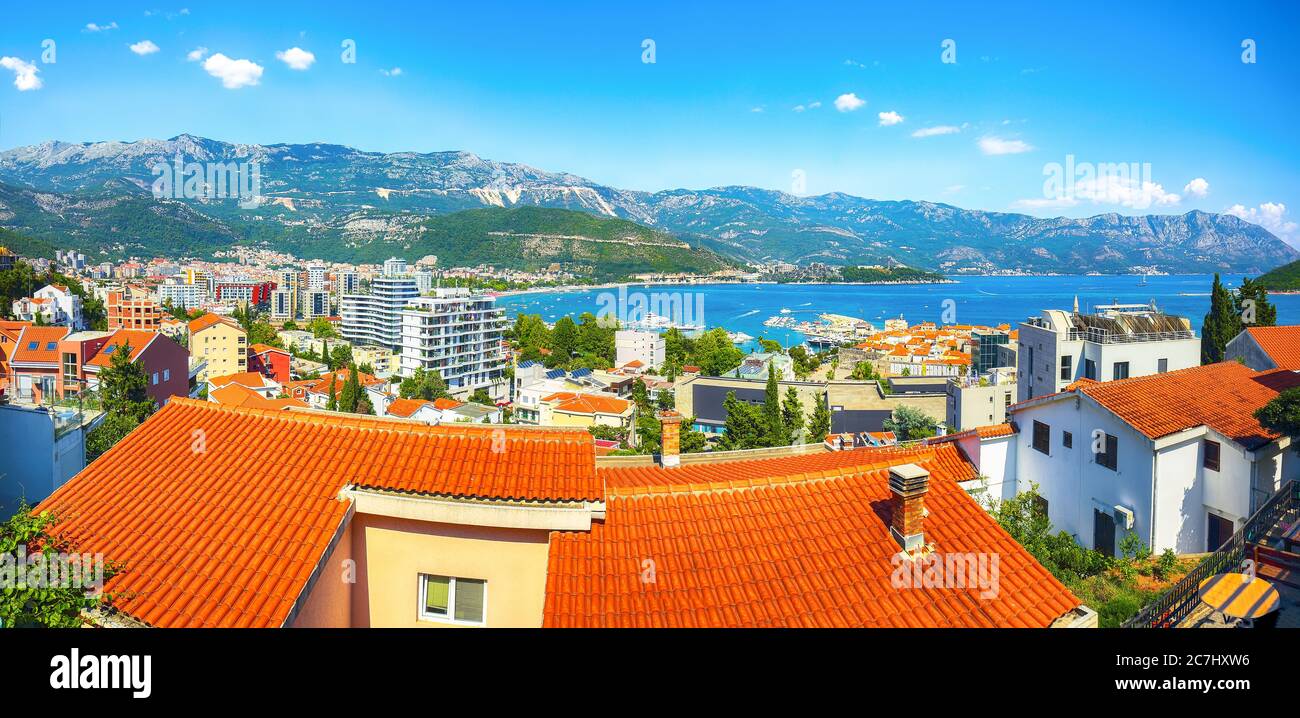 Panoramic summer view of Adriatic sea coast and Budva city with lots of ...