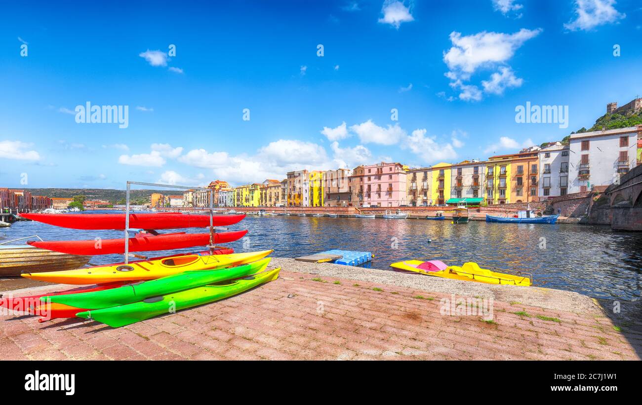 Panoramic cityscape of Bosa town on Temo river. River embankment with ...