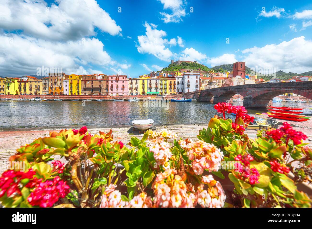 Amazing cityscape of Bosa town with Ponte Vecchio bridge across the ...