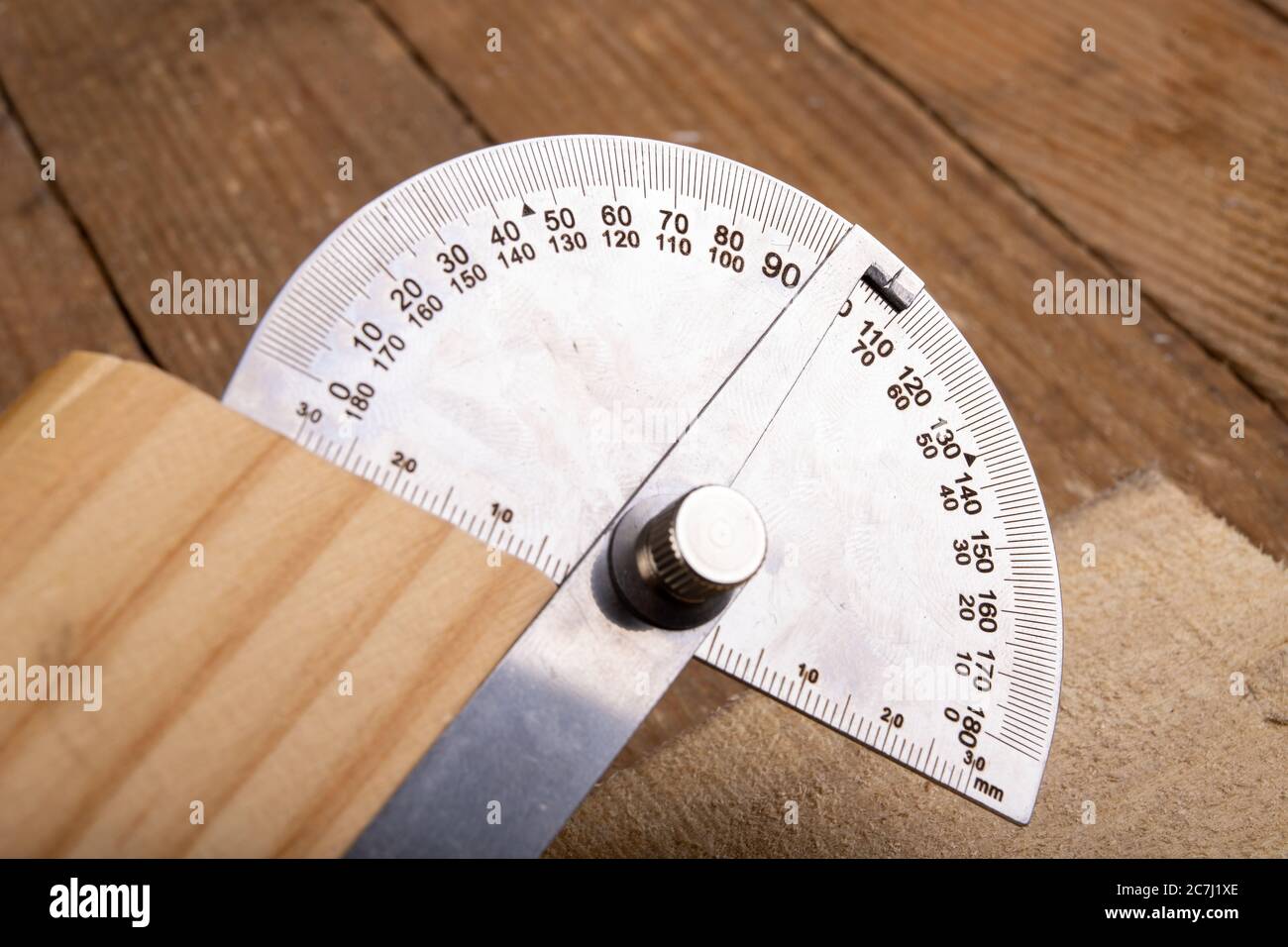 Metal protractor for measuring in carpentry. Minor work in a home ...