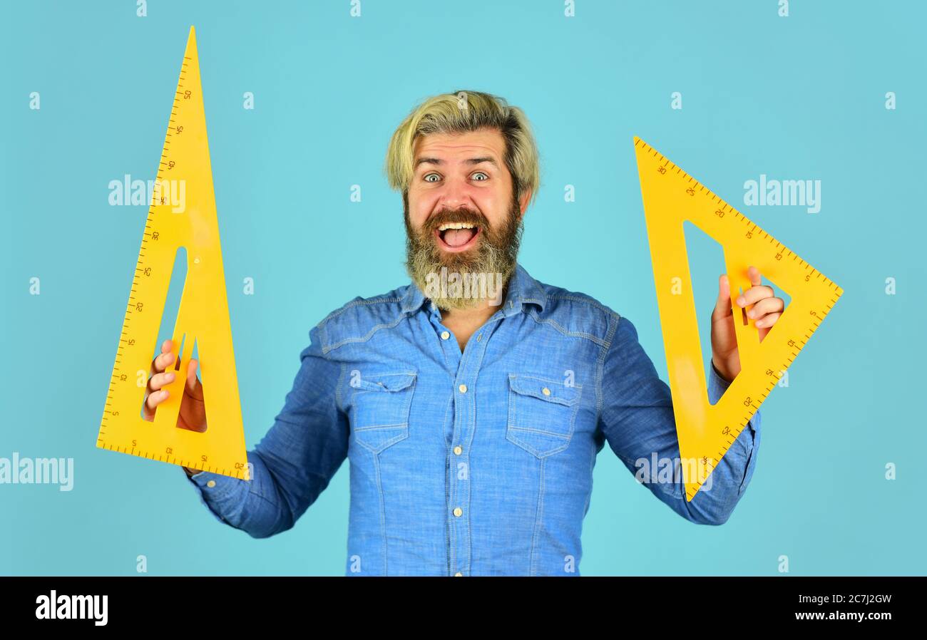 Teaching geometry. Find perfect angle. Architect education. Bearded man ...