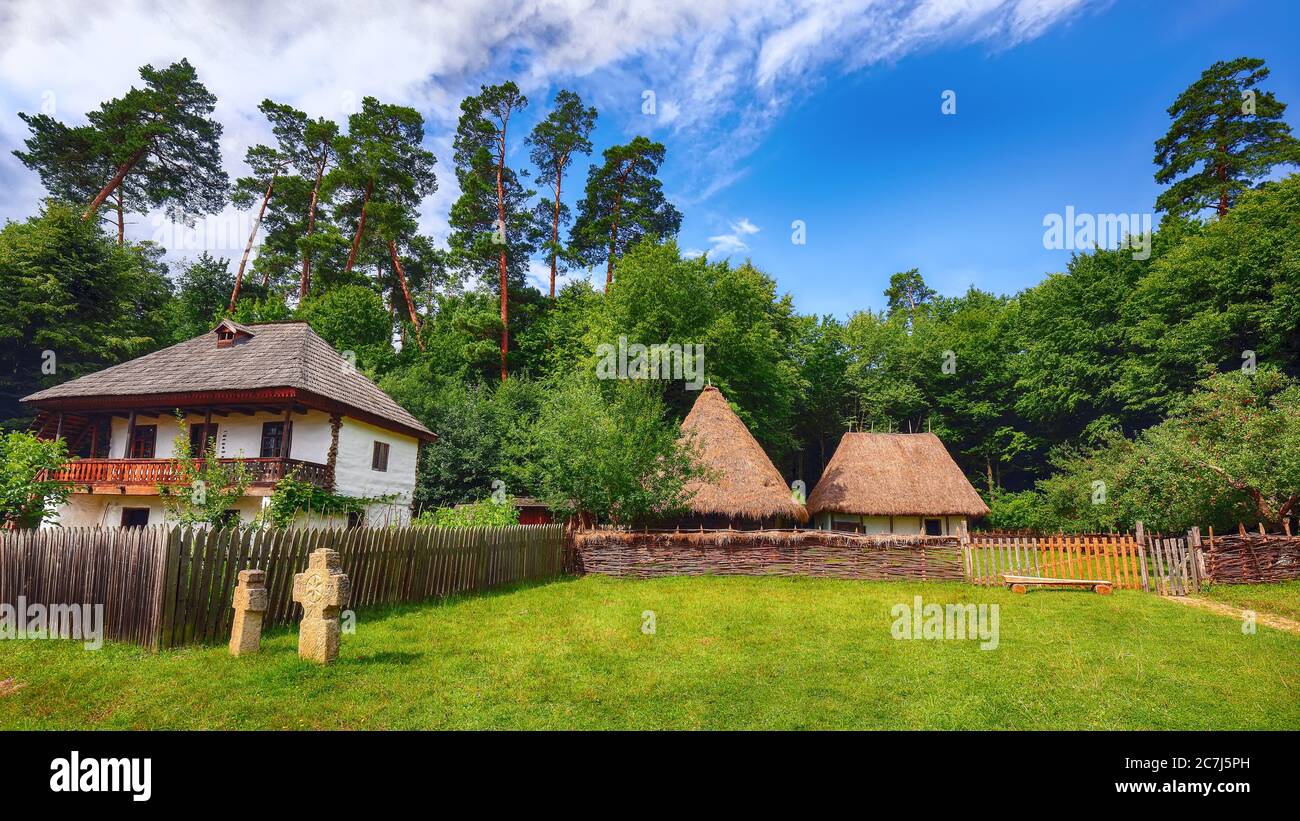 Fantastic summer scene in Transylvania. View of traditional romanian ...