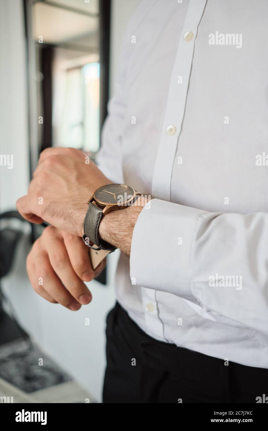 Wearing Wrist Watch High Resolution Stock Photography and Images - Alamy