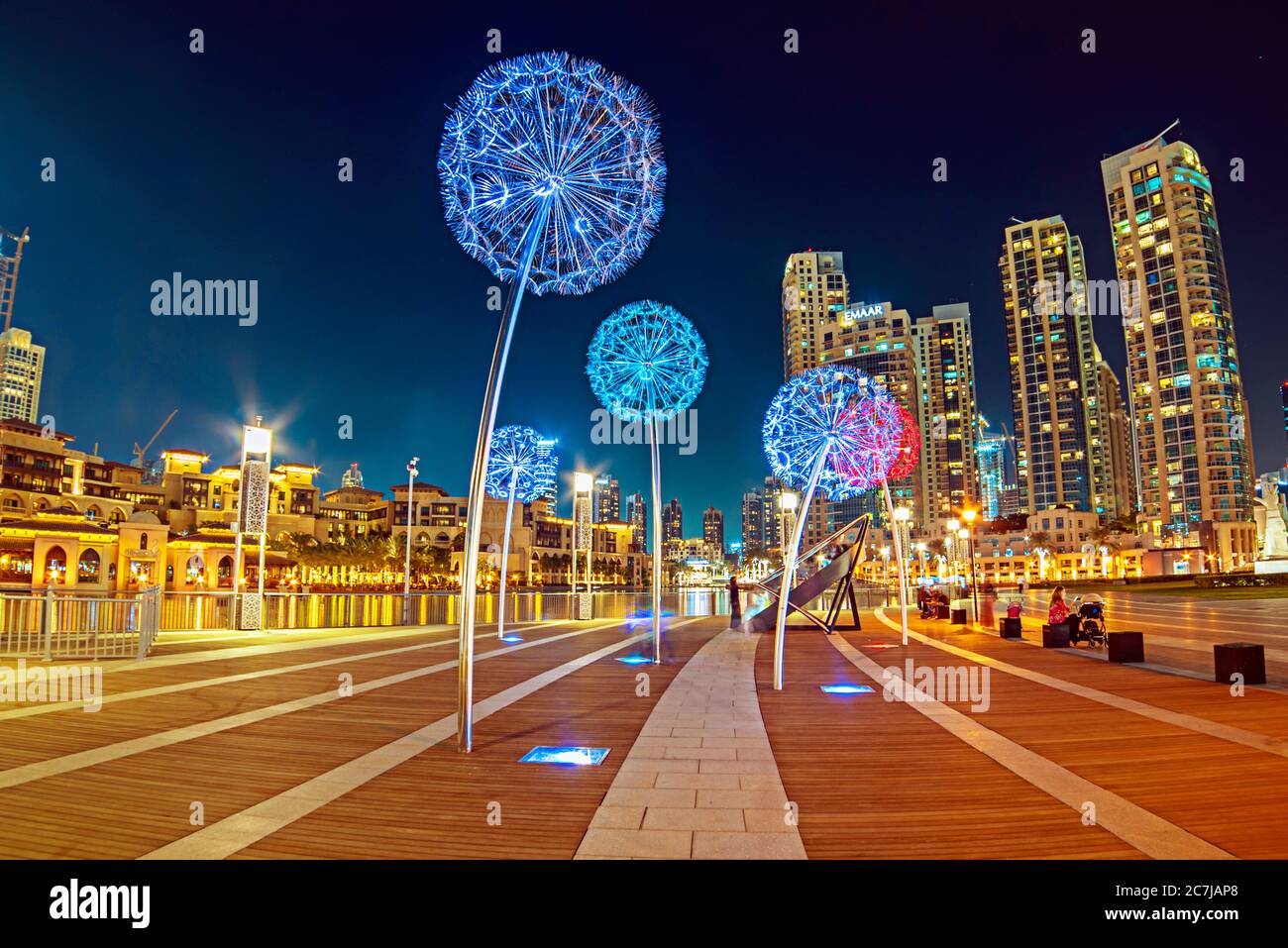 Night urban street of Dubai, UAE with flower colorful lanterns Stock ...