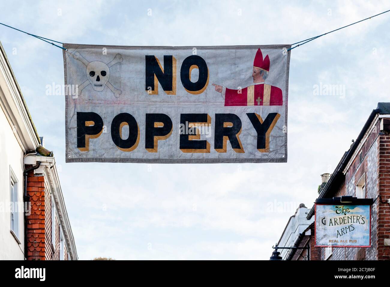 A No Popery Sign Hangs In The Street During The November 5th Bonfire ...