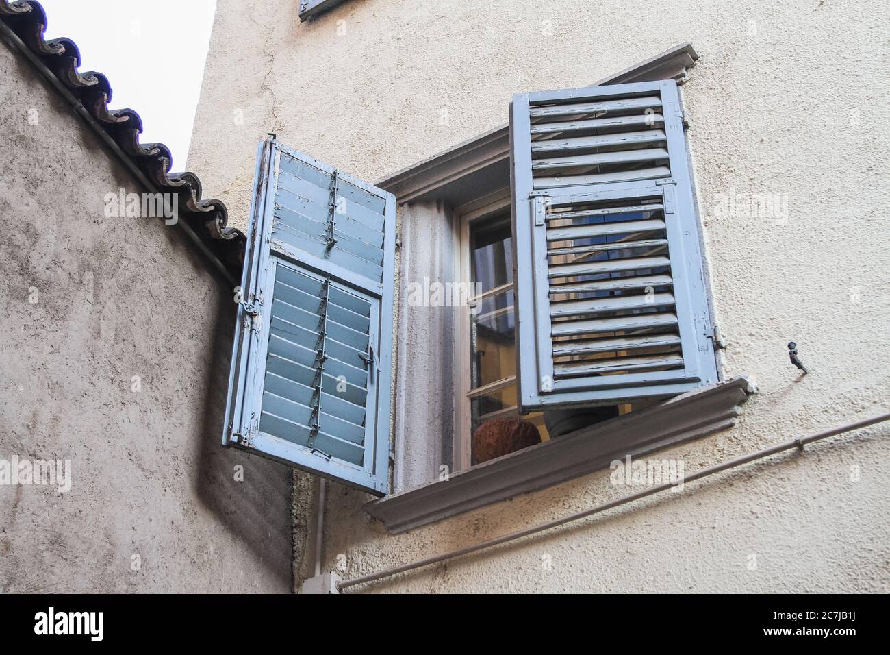 Low angle shot of an open window in Italy Stock Photo - Alamy