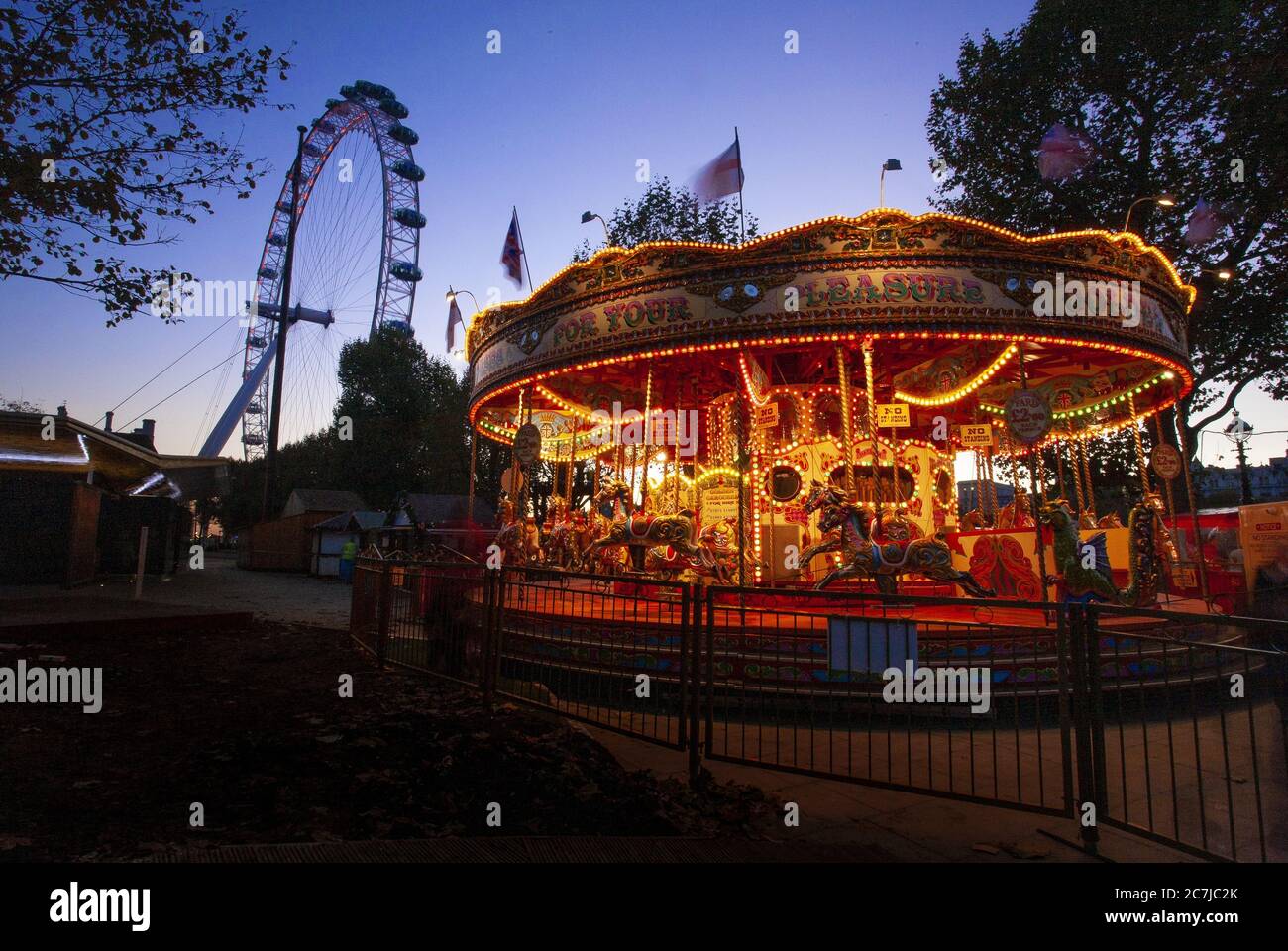 LONDON, UNITED KINGDOM - Nov 11, 2012: Fairground roundabout stands on ...