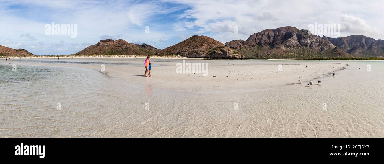 A couple walking off Balandra Beach, BCS Mexico Stock Photo - Alamy