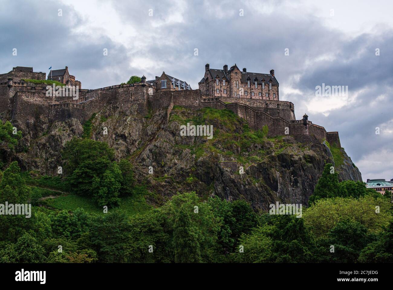 Edinburgh Castle sitting atop Castle Rock in Edinburgh, Scotland is an ...