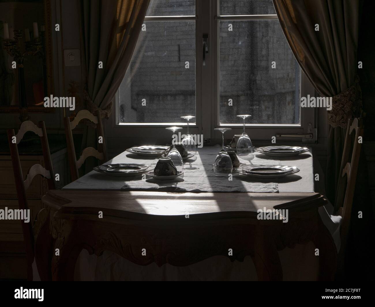 Elegant setting of a table with silverware at the window Stock Photo ...