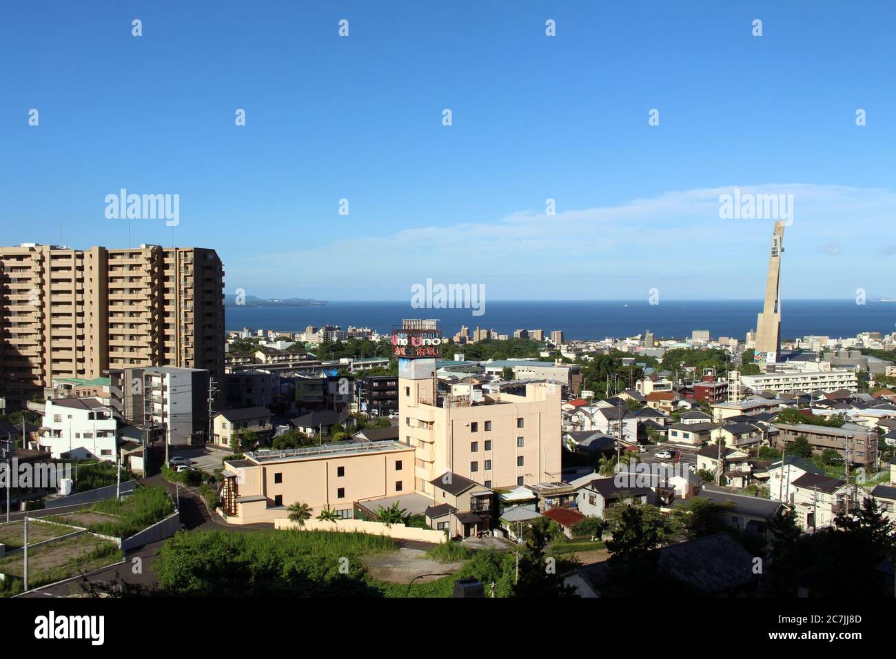 The panoramic view of Beppu City, its Tower, and the sea in Oita ...