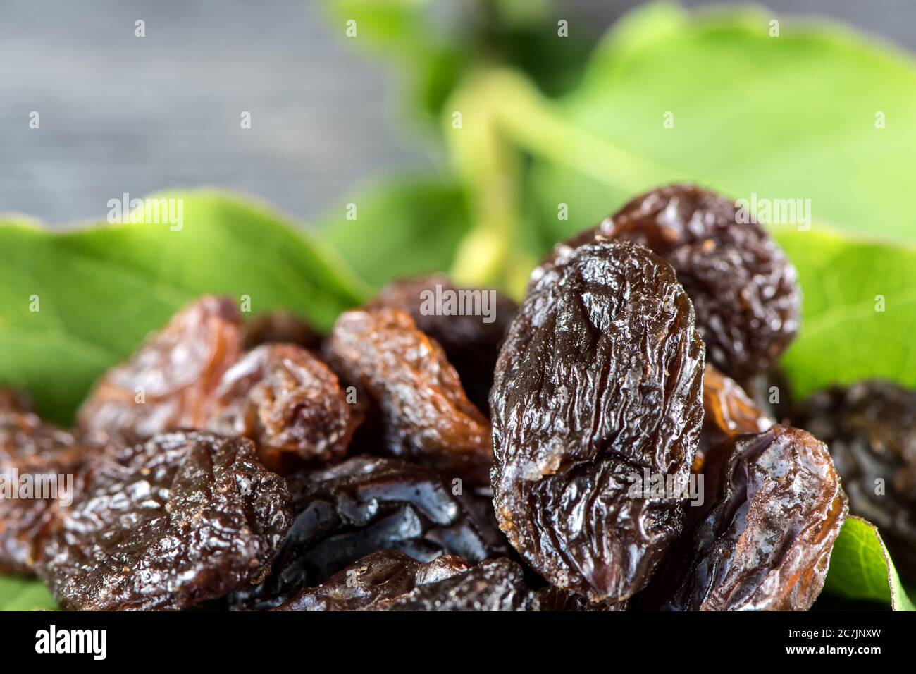 Raisins with reflection. extreme closeup showing detailed texture on ...