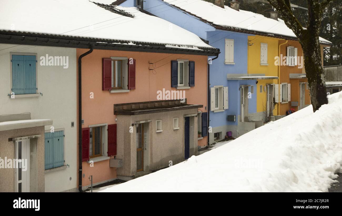 Scenery of a snowy town with cute colorful houses Stock Photo - Alamy