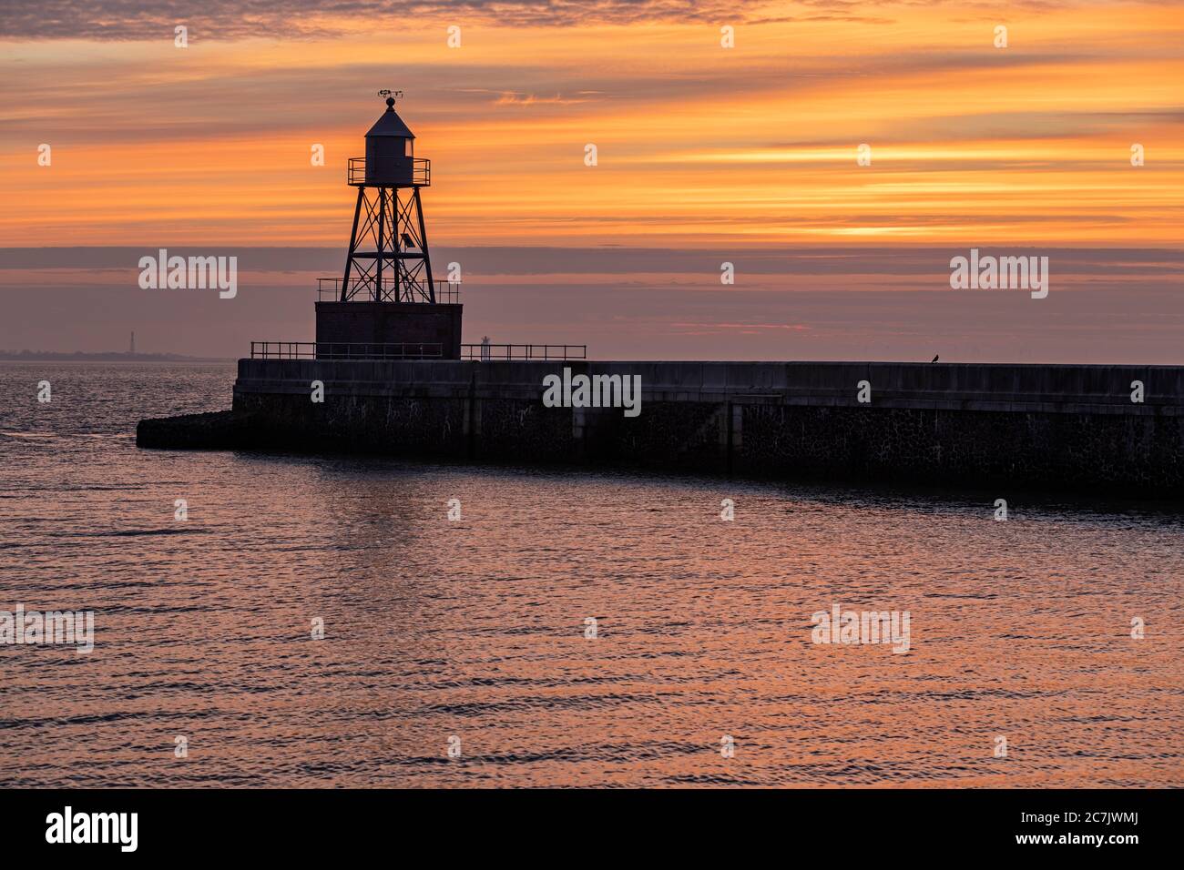 Sunrise, pier fire on the pier of the former third port entrance in ...
