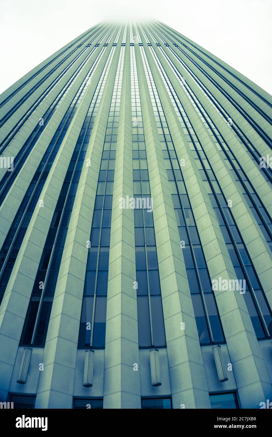 Skyscaper building with vertical leading architectural lines towering ...