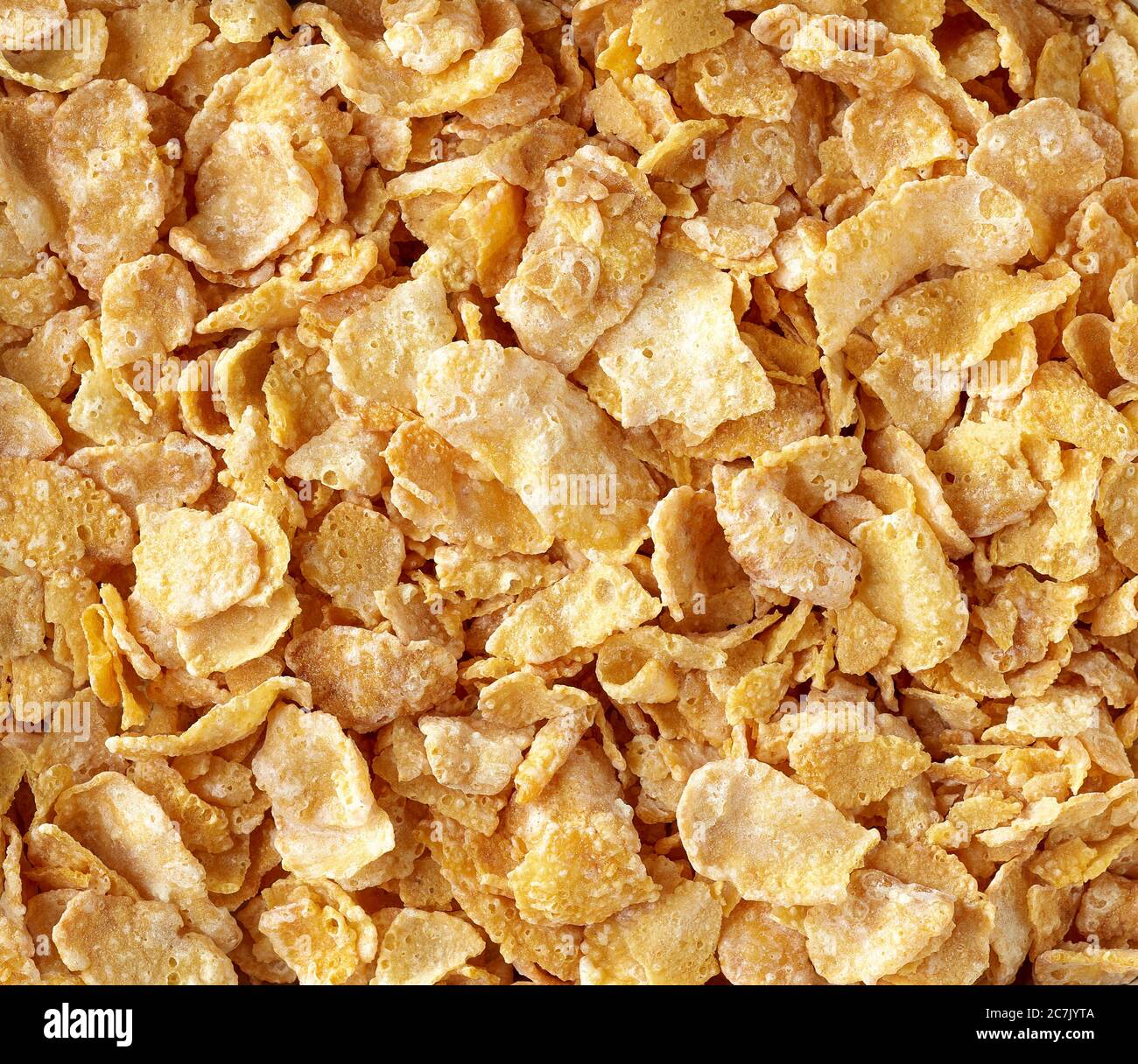 sweet breakfast corn flakes background Stock Photo - Alamy