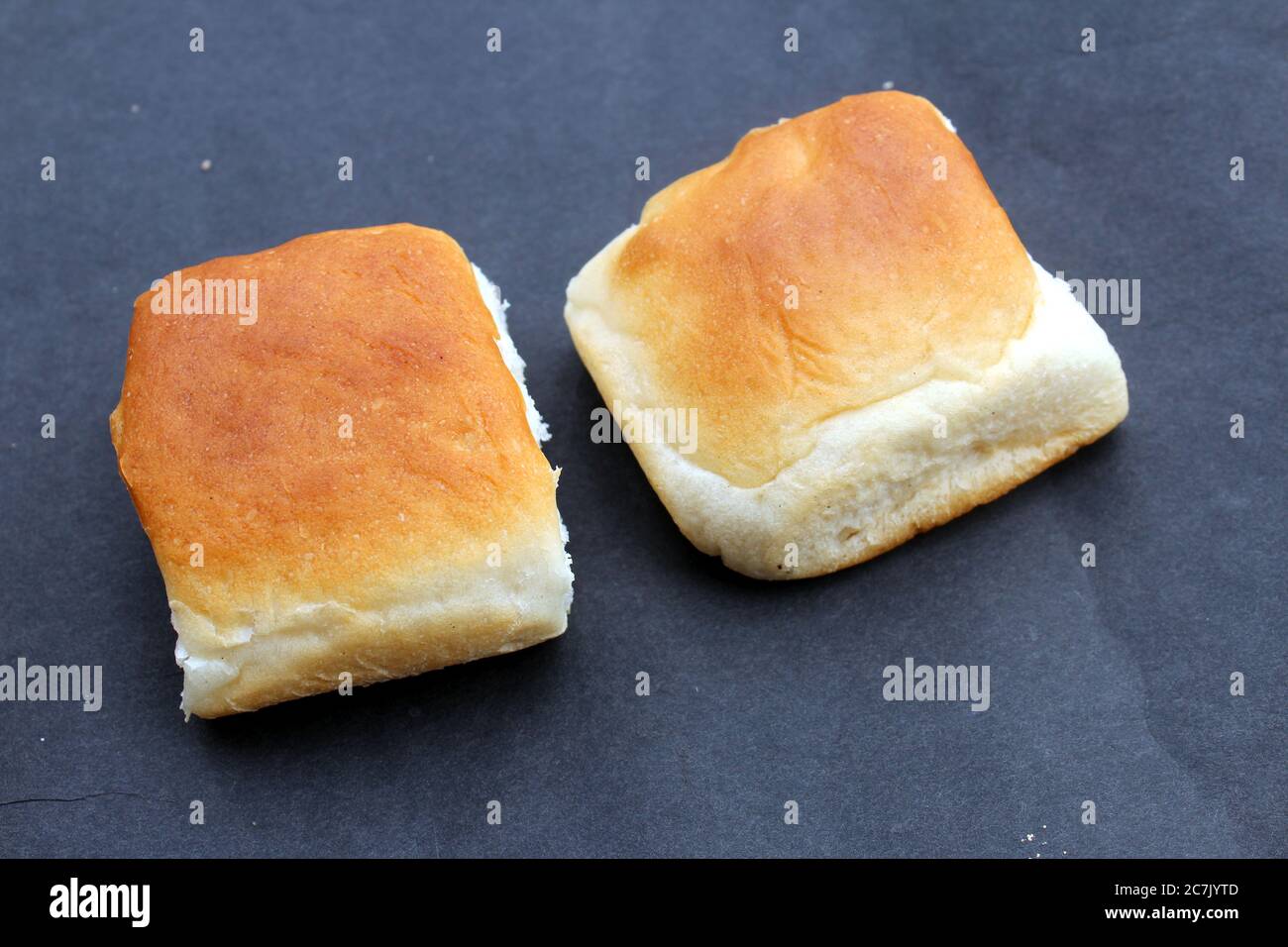 bread pav food isolated on black background Stock Photo - Alamy