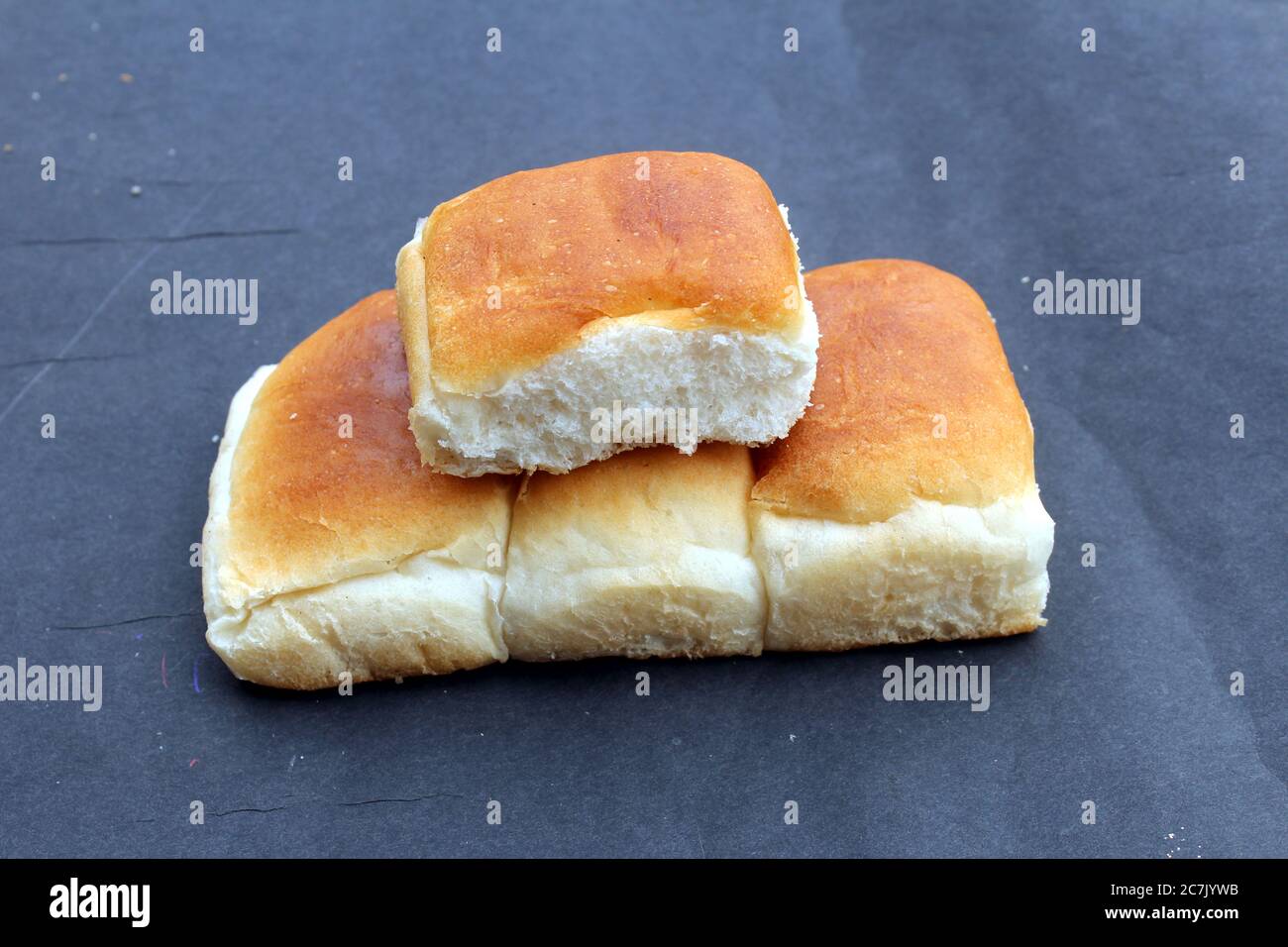 bread pav food isolated on black background Stock Photo - Alamy