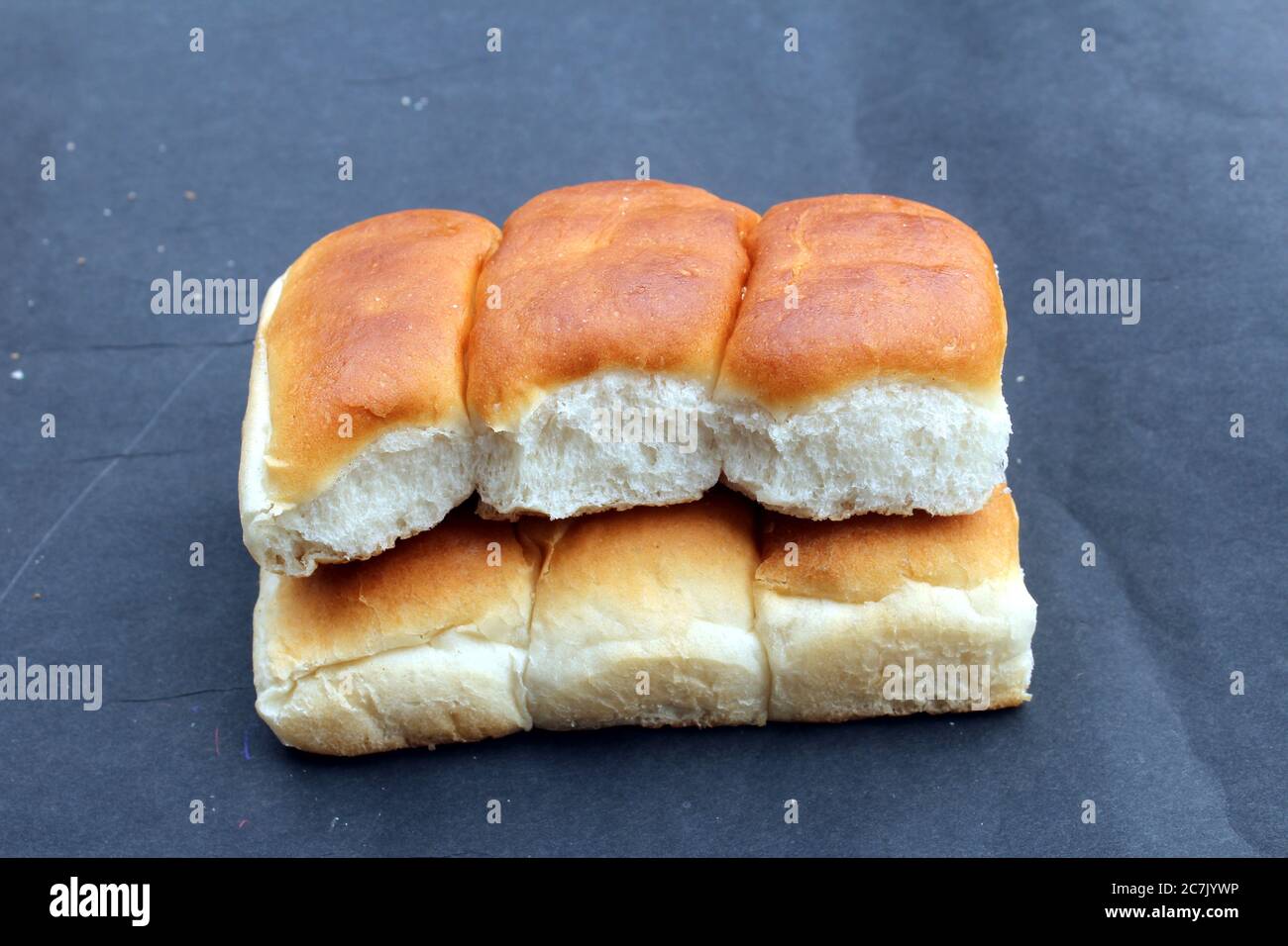 bread pav food isolated on black background Stock Photo - Alamy