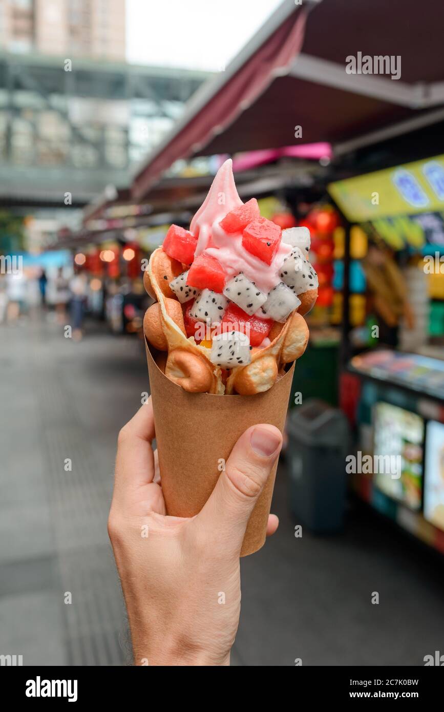 Bubble waffle ice cream cone hi-res stock photography and images - Alamy