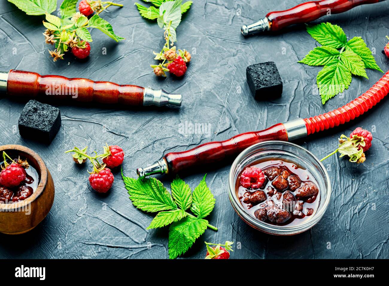 Oriental smoking hookah with tobacco with the aroma of raspberry jam ...