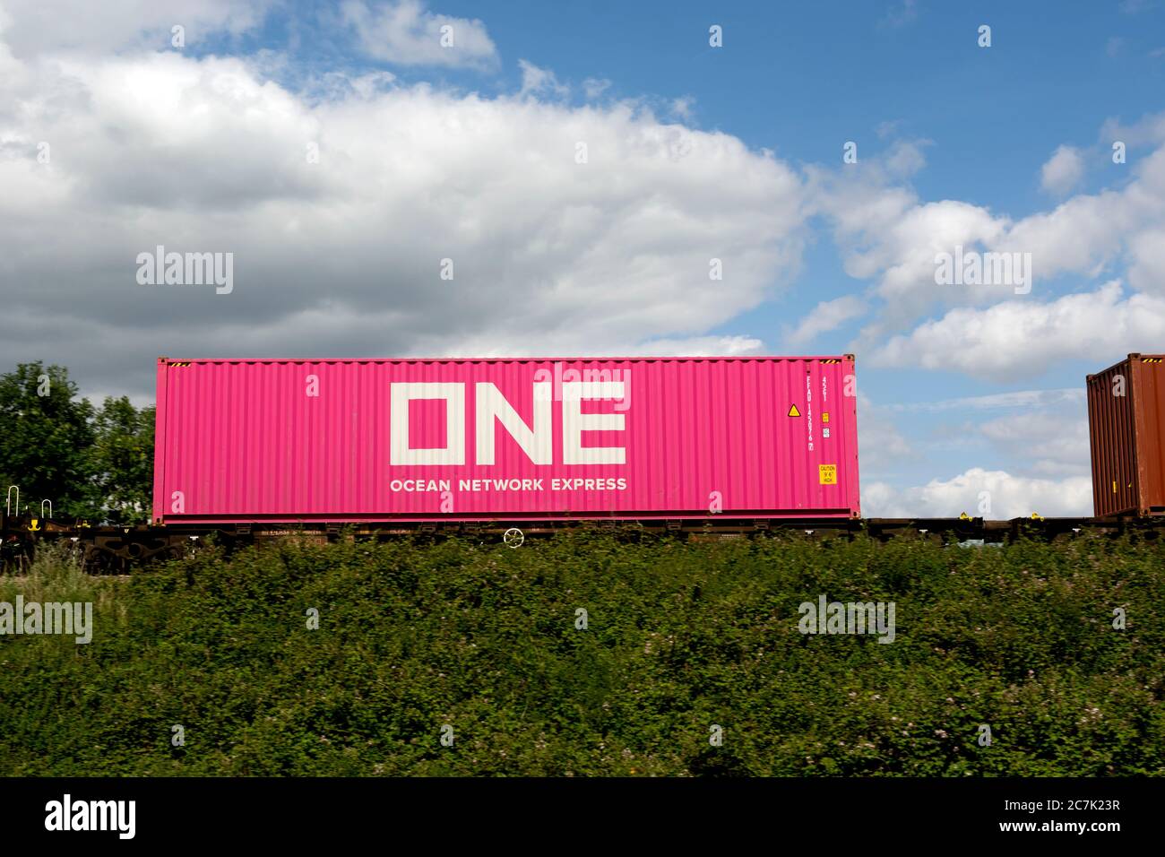 ONE (Ocean Network Express) shipping container on a freightliner train ...