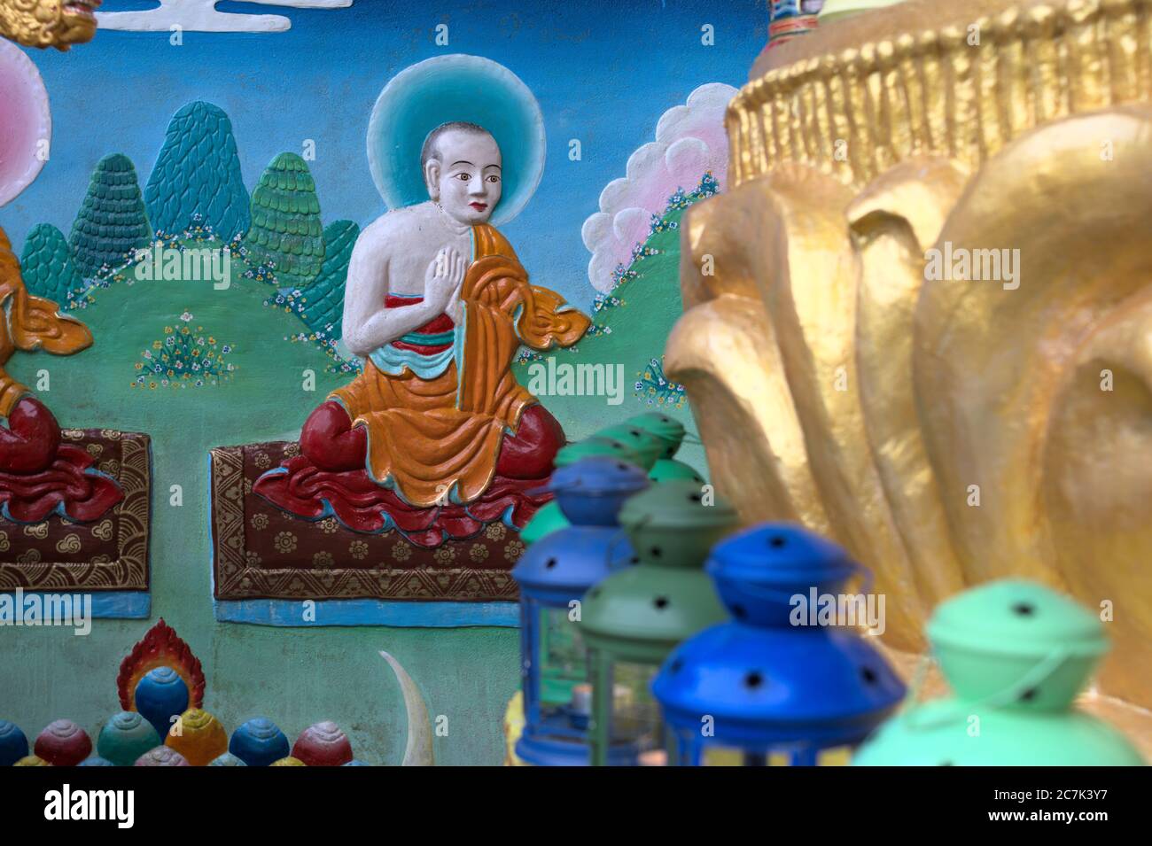 Painting at the foot of the large Buddha statue at the Tibetan Buddhist ...