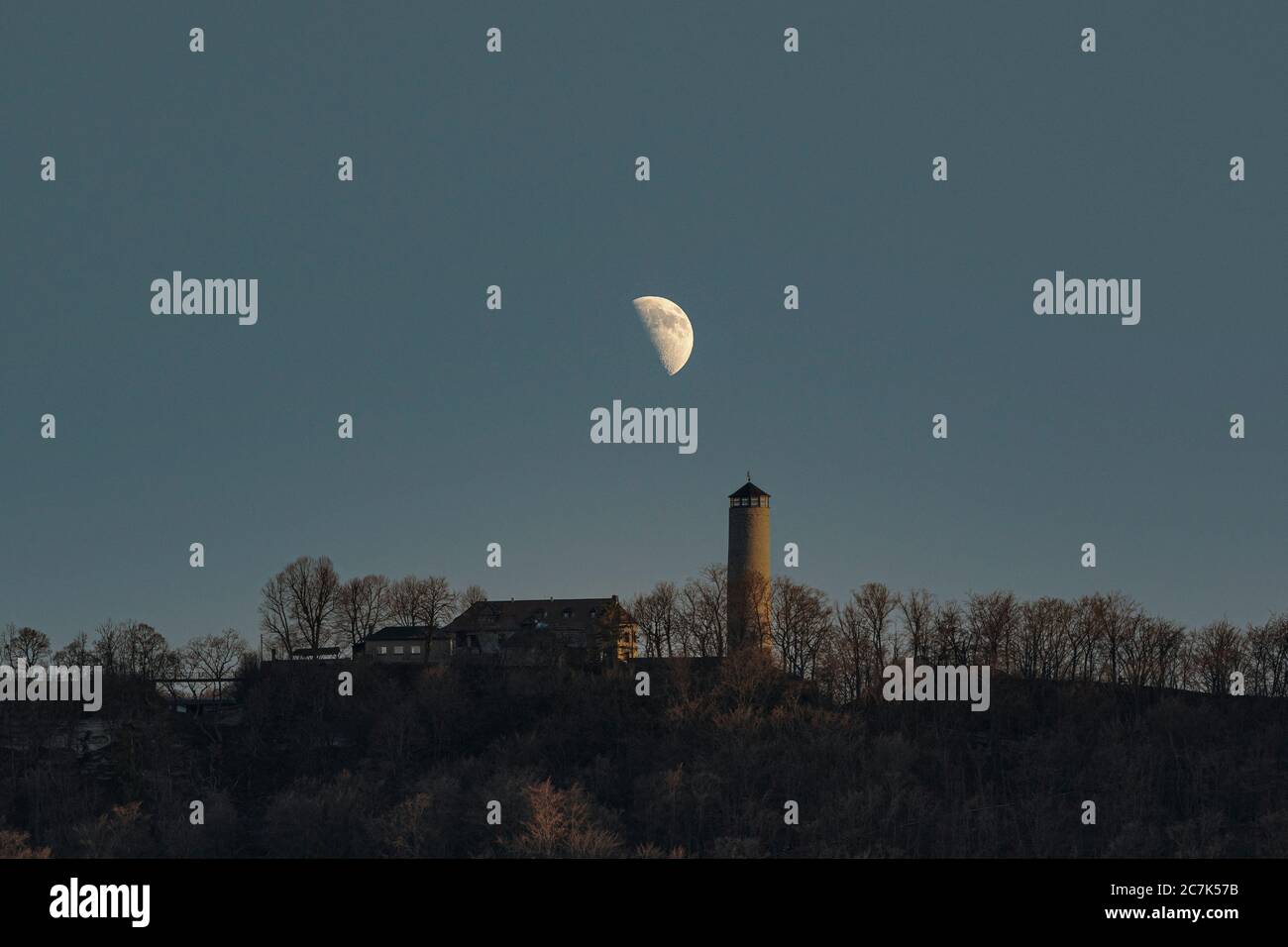 Fox tower at sunset with crescent moon Stock Photo - Alamy