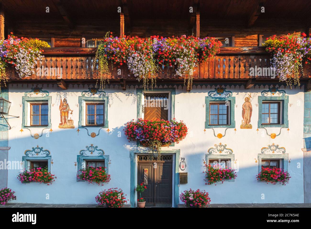 Obertilliach, typical facades of historic houses with decorations and ...