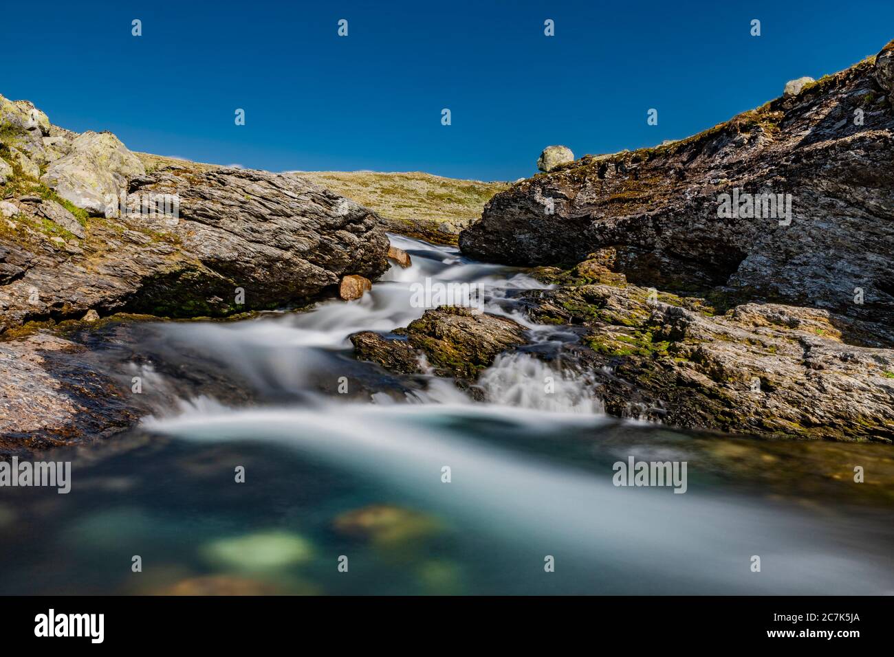 Mountain stream with clear water in Norway Stock Photo - Alamy