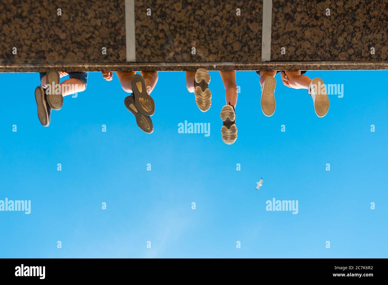 Man hanging from balcony hi-res stock photography and images - Alamy